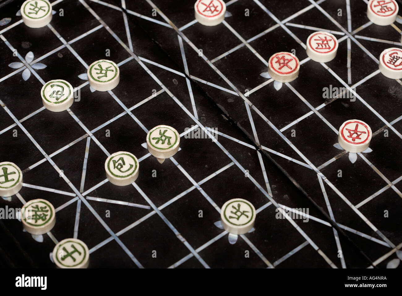 Chinese Chess pieces on a board Xiangqi Stock Photo - Alamy