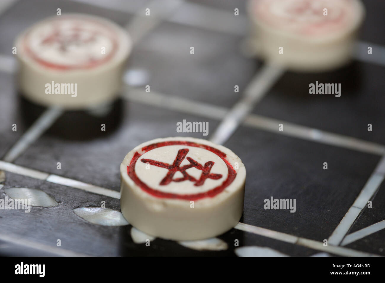 Chinese Chess pieces on a board Xiangqi Stock Photo - Alamy