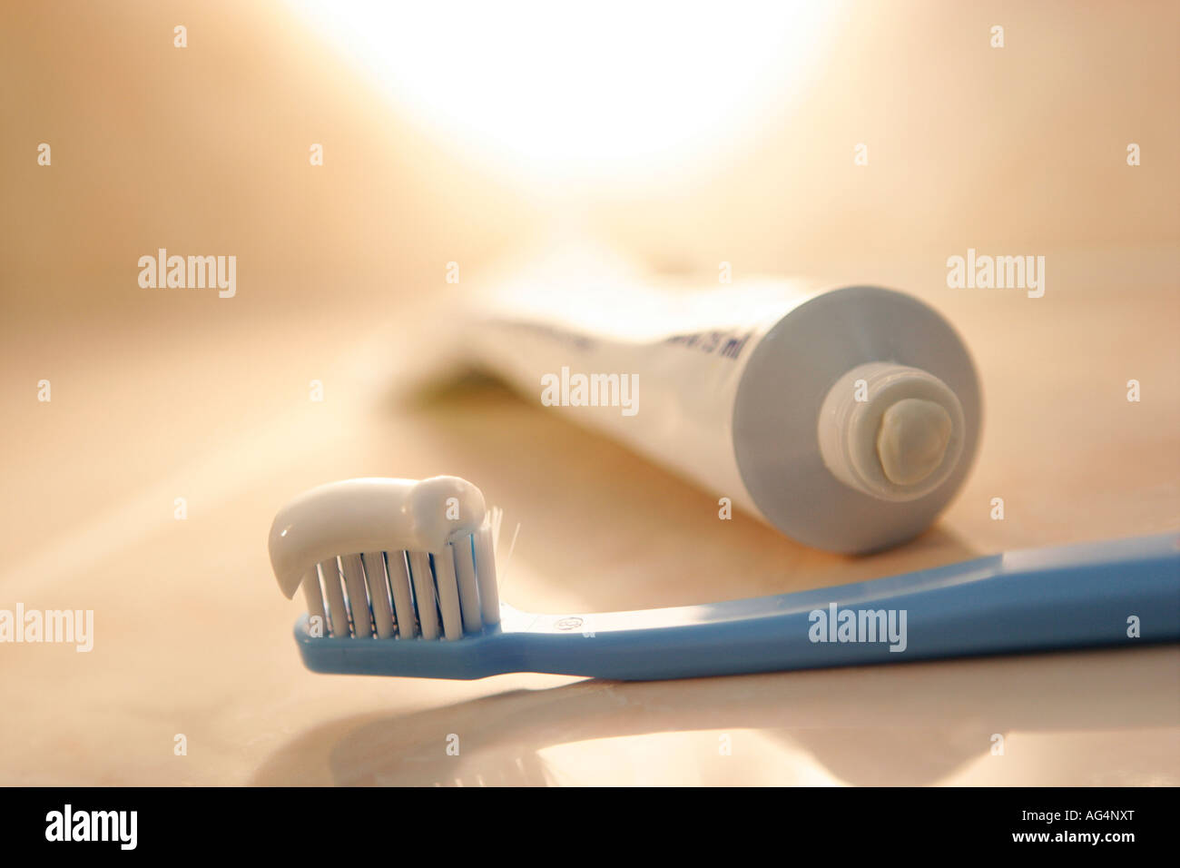 Toothbrush and toothpaste Stock Photo - Alamy