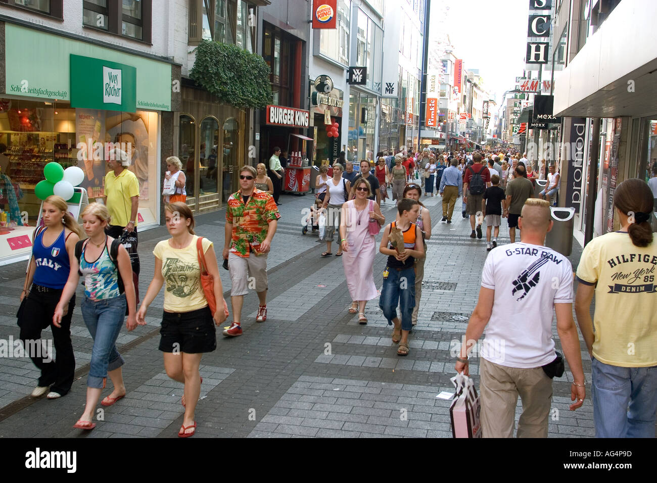 Germany North Rhine Westphalia Cologne People walking in Hohe strasse a ...