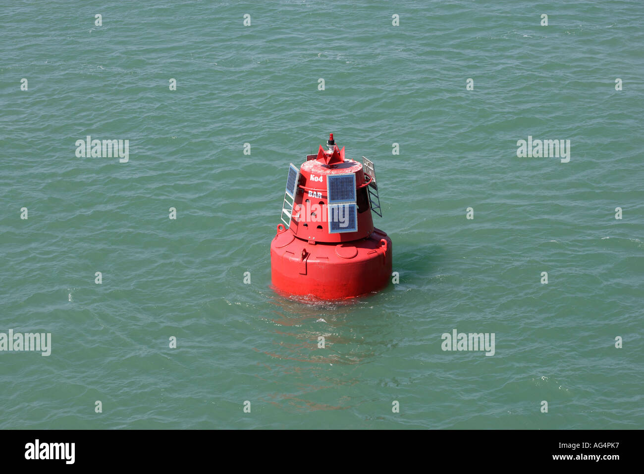 Red marine Buoy at sea Stock Photo - Alamy