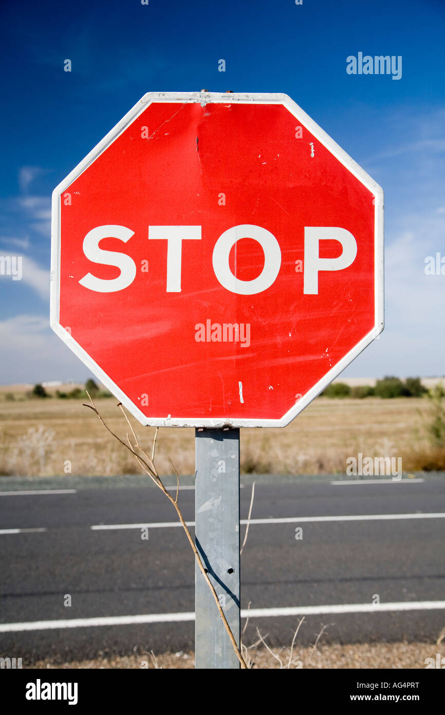 Stop sign in front of a deep blue sky Spain Stock Photo - Alamy
