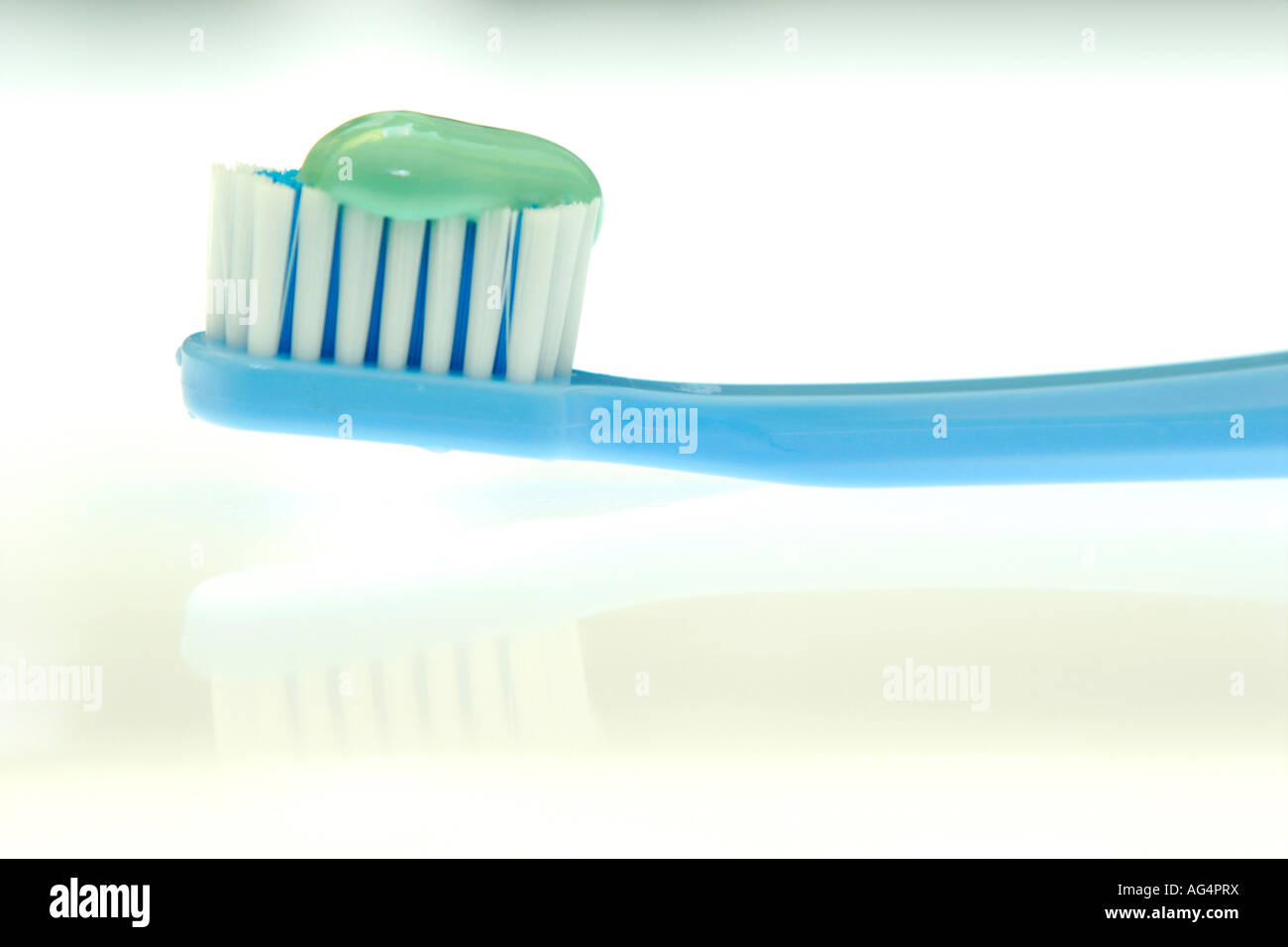 Toothbrush and toothpaste Stock Photo - Alamy