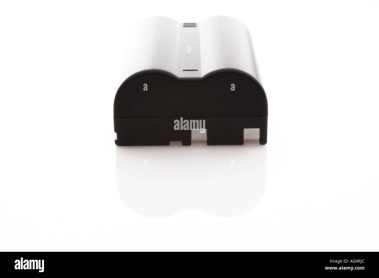 Digital camera battery on white background Stock Photo - Alamy