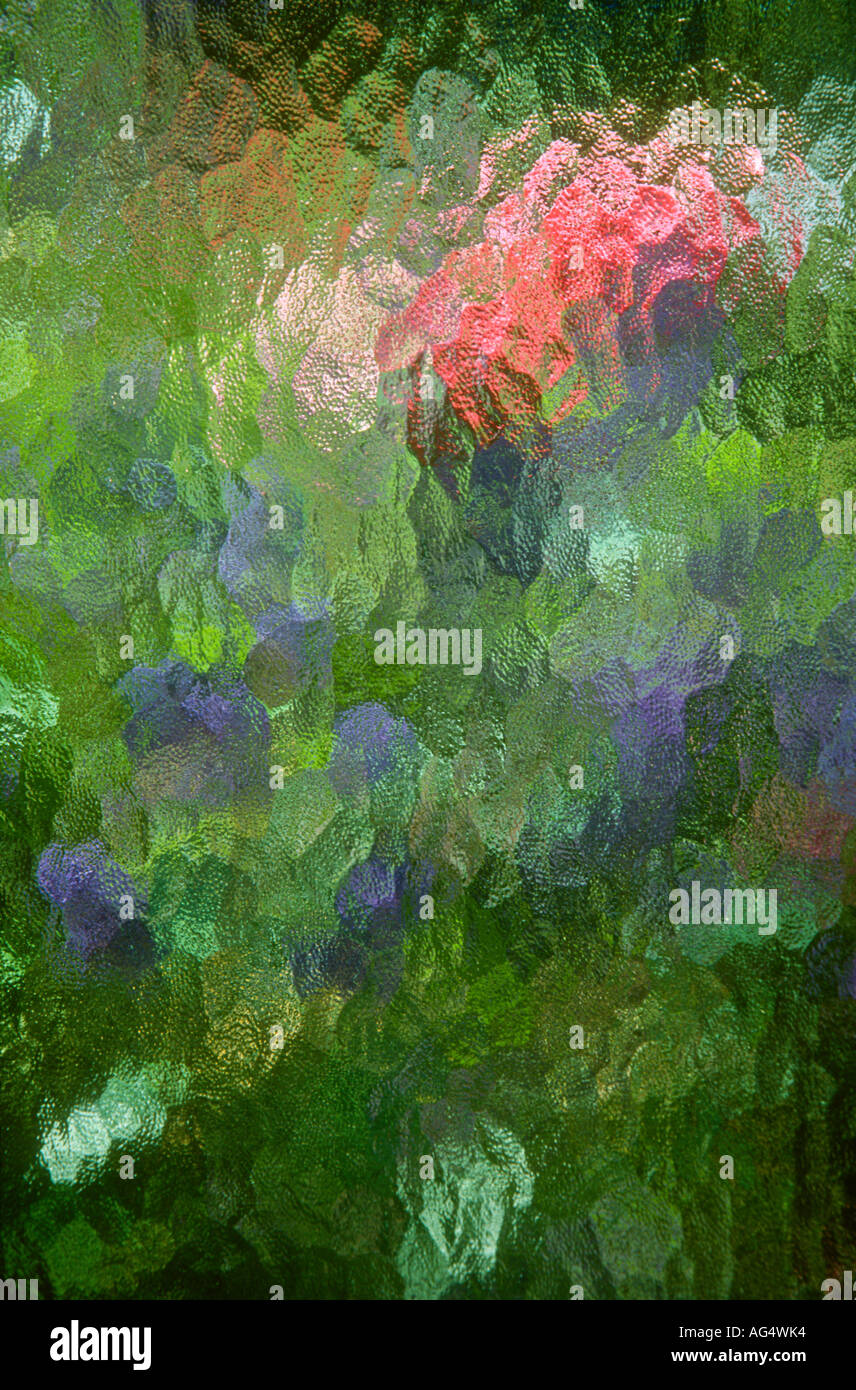 Frosted glass and garden flowers Stock Photo - Alamy