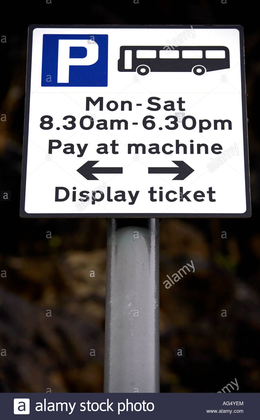 Bus parking regulations signpost Stock Photo - Alamy