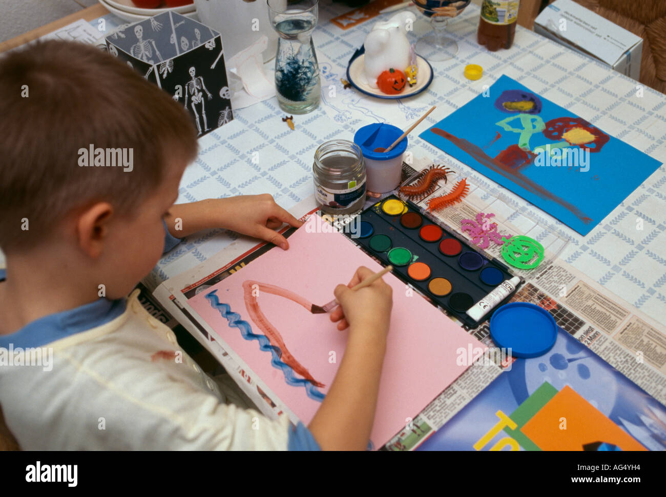 Boy is painting Stock Photo - Alamy