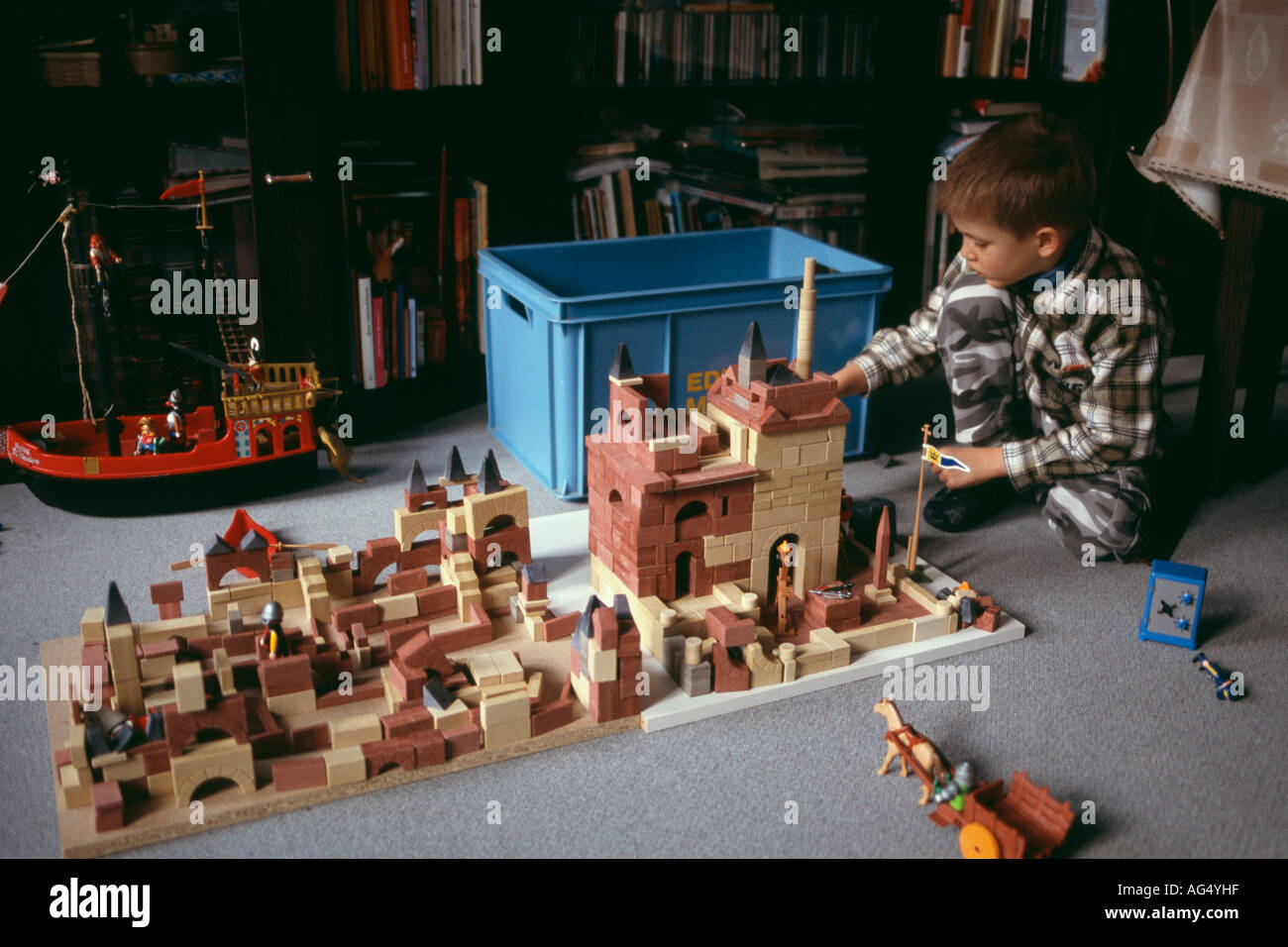 Boy is playing with Anker blocks Stock Photo - Alamy