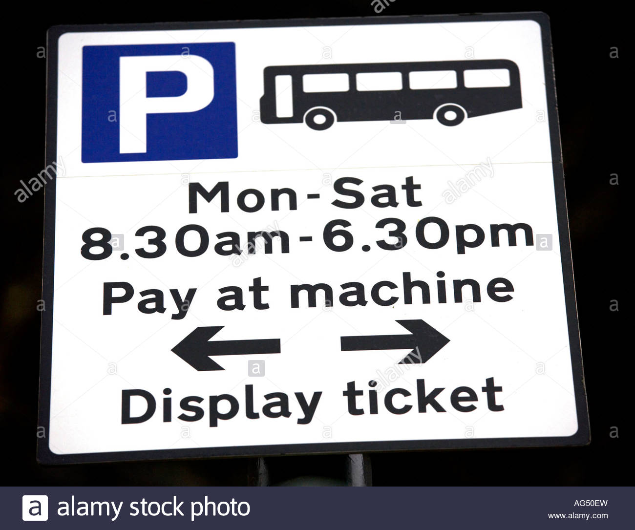 Bus parking regulations signpost Stock Photo - Alamy