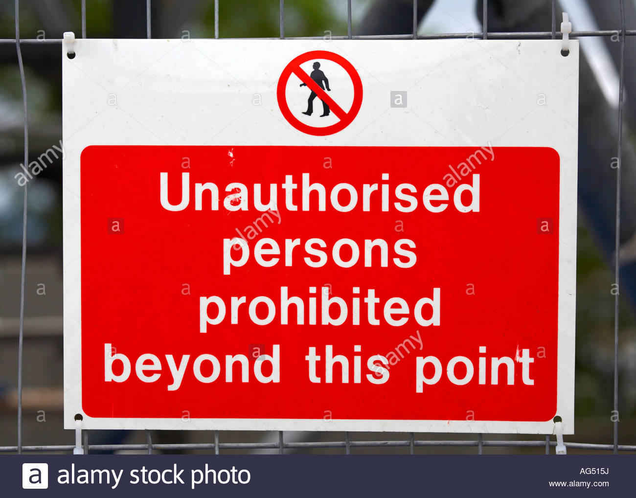 Unauthorised persons prohibited beyond this point signpost Stock Photo ...