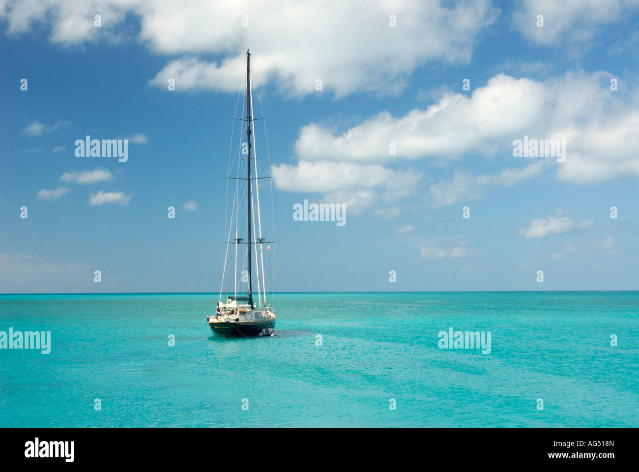 A large sailing yacht on turquoise waters in the Bahamas Stock Photo ...