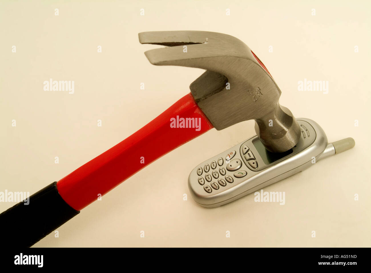 Hammer hitting mobile phone hi-res stock photography and images - Alamy
