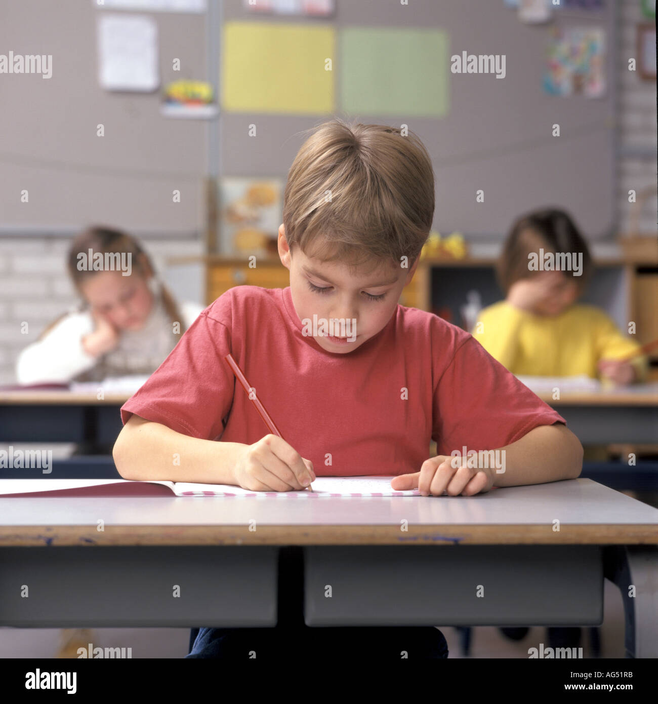Child in classroom Stock Photo - Alamy
