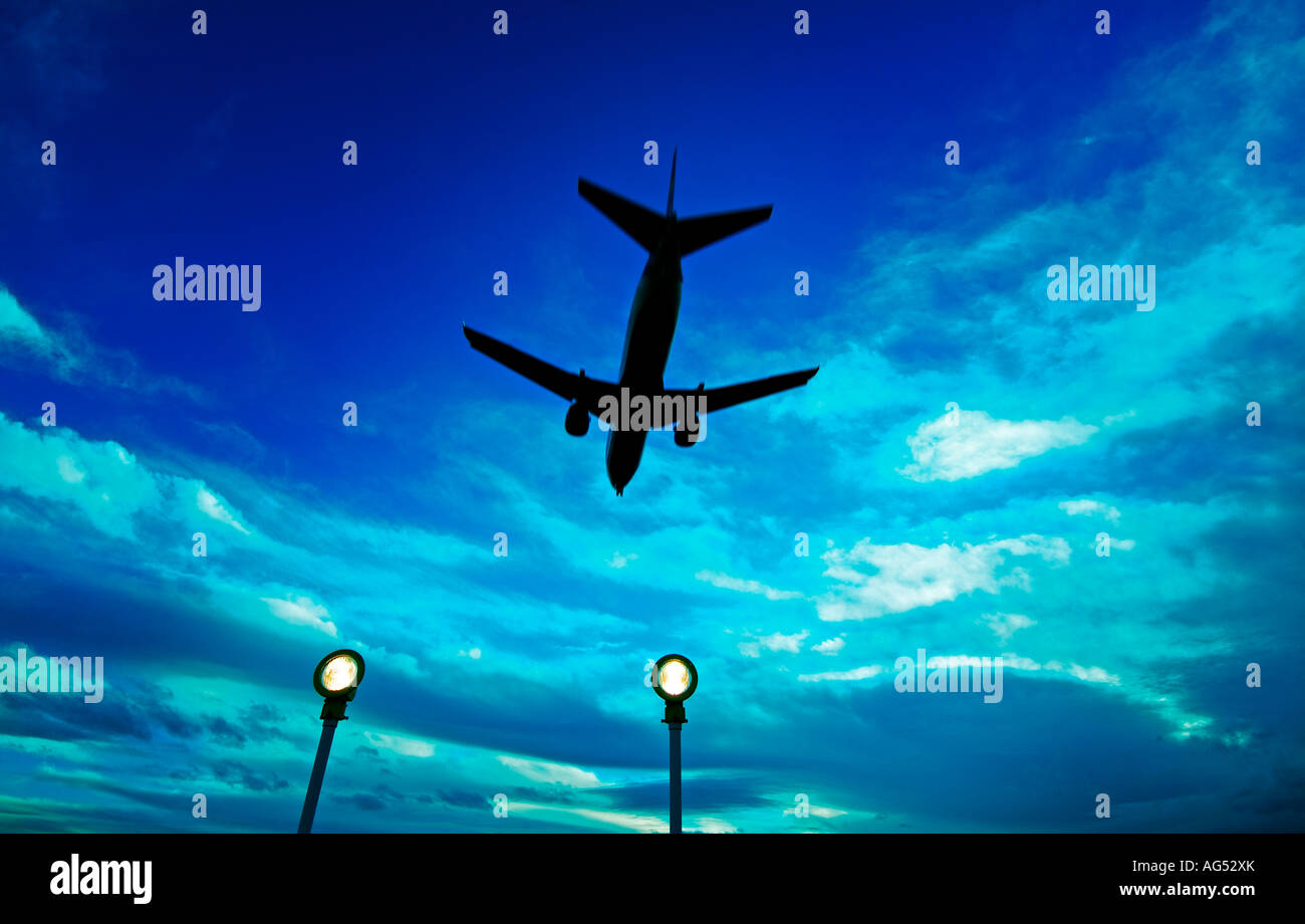 Boeing 737 landing over ILS lights on runway Stock Photo - Alamy