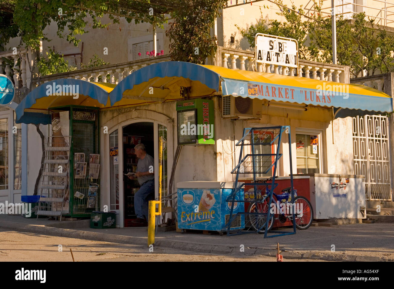 Small corner store in the coastal town of Petrovac by the dock Stock ...