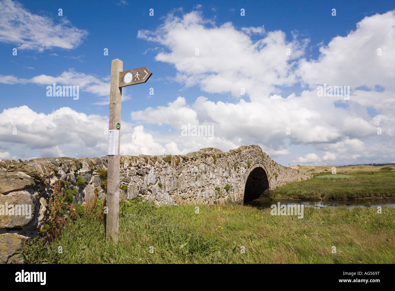 OLD STONE BRIDGE across the Afon Ffraw River with Isle of Anglesey ...
