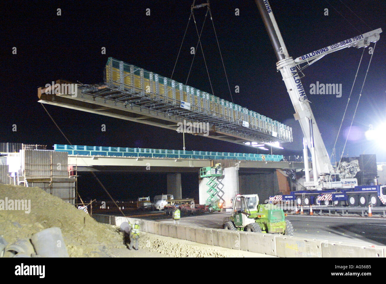 Road bridge Building Section being lifted into Place Stock Photo - Alamy