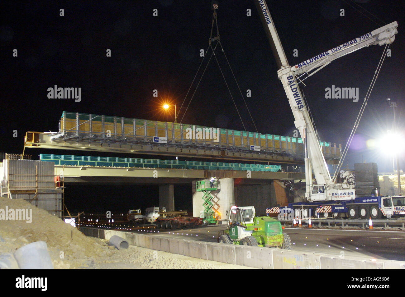 Bridge Building Section being Lifted Over Motorway Stock Photo - Alamy