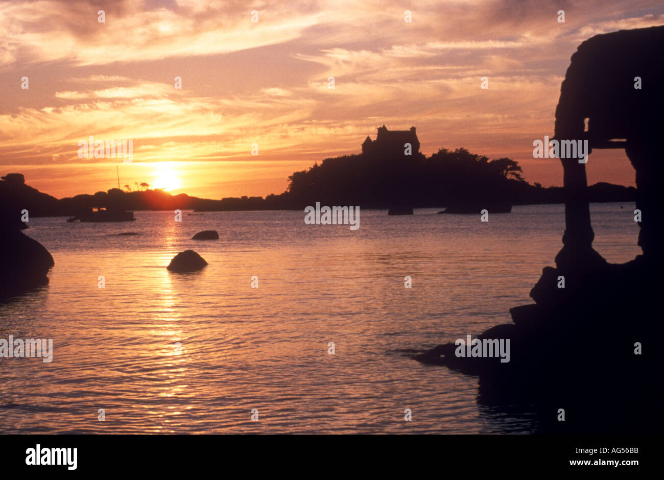 Sunset over Costaeres Castle Stock Photo - Alamy