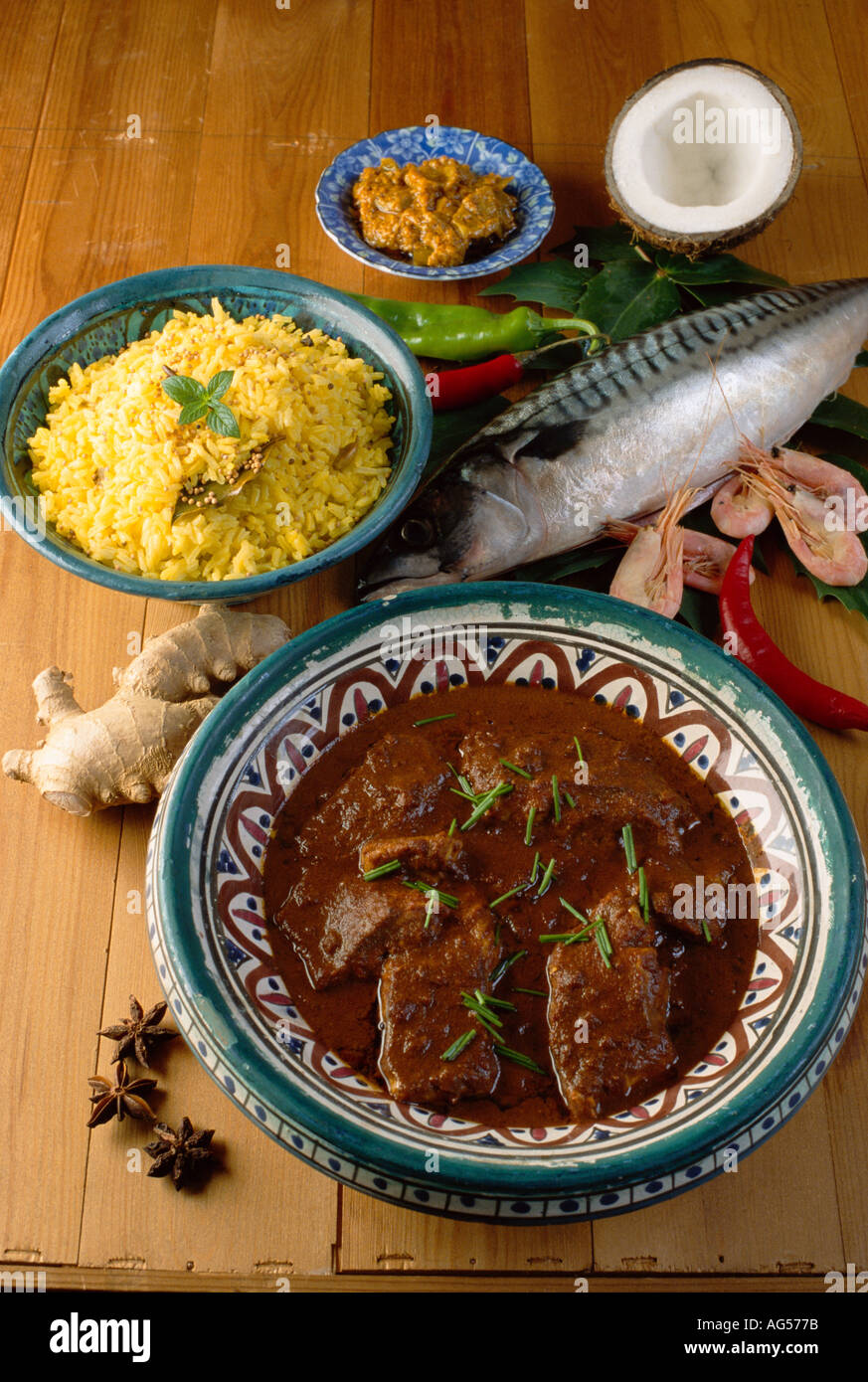 India Goa Fish curry and rice Stock Photo - Alamy