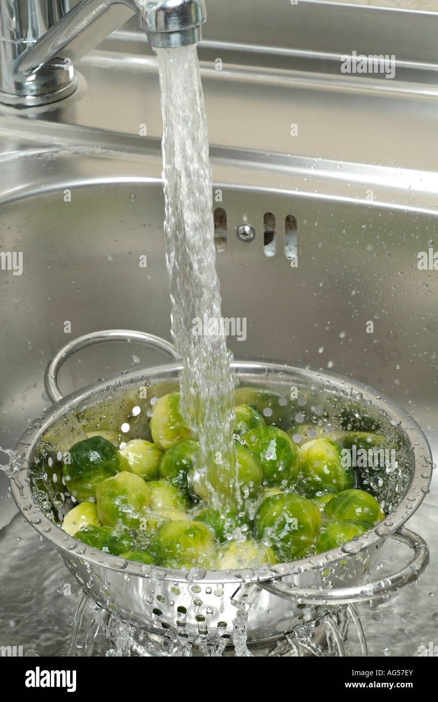 Brussel Spouts Being Washed in a Colander Before Cooking Stock Photo ...