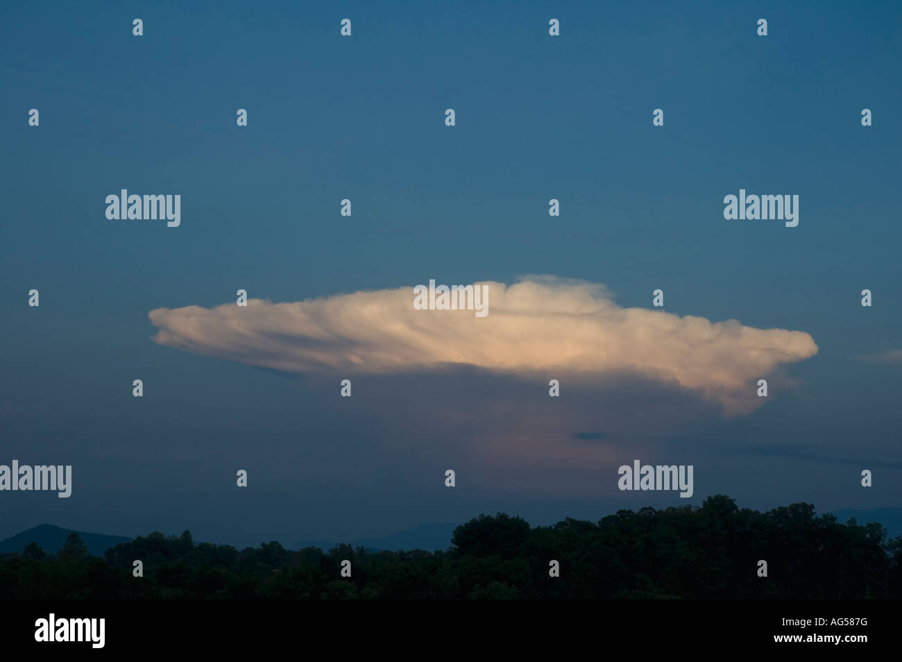 Dynamic Cloud on the Horizon near Sunset Stock Photo - Alamy