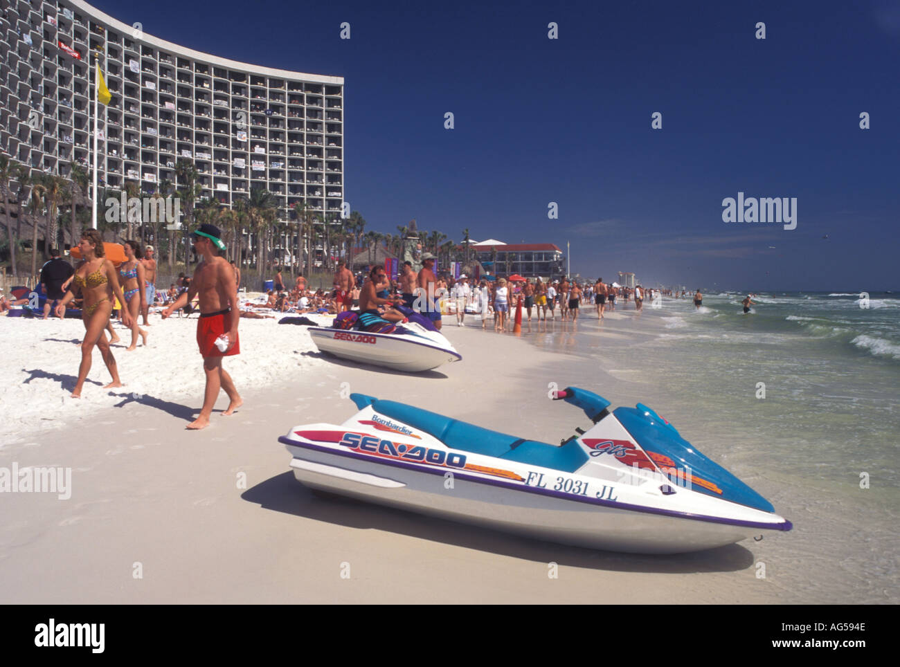 Teens tanning on beach hi-res stock photography and images - Alamy