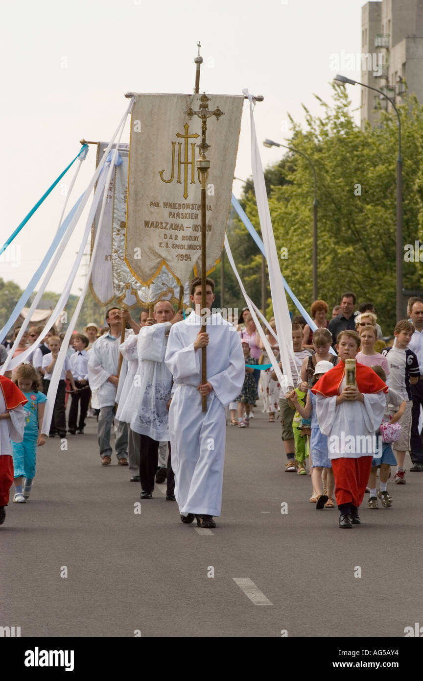 Polish Roman Catholic priest carrying cross during Corpus Christi Day ...