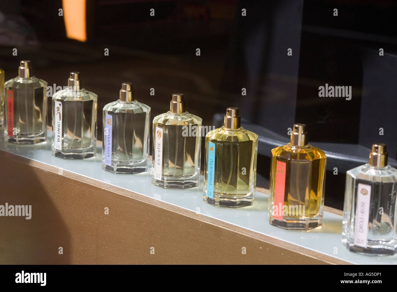 Perfume bottles in shop window in the City of London GB UK Stock Photo ...