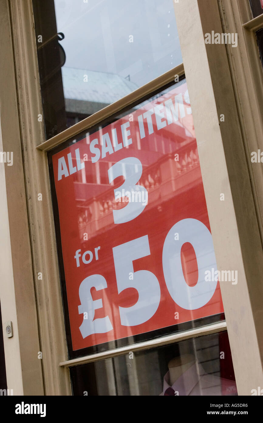 Sale poster in shop window All sale items 3 for £50 Stock Photo - Alamy