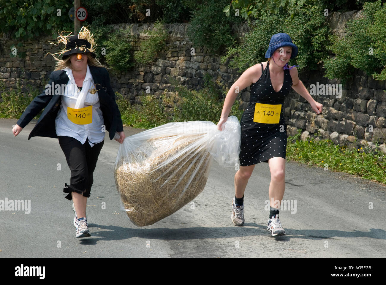 Runners in the 2006 Oxenhope Straw Race Stock Photo - Alamy