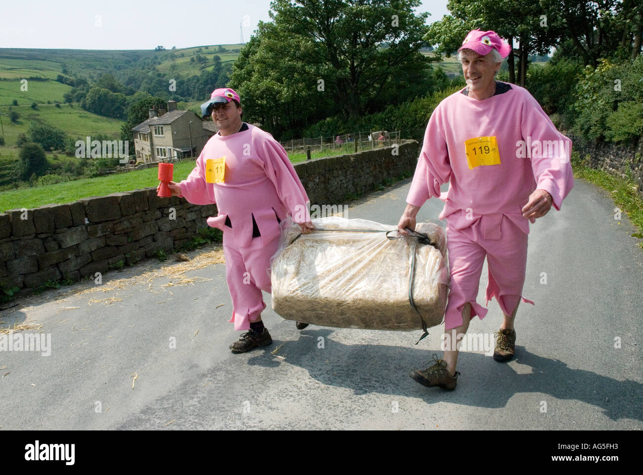 Runners in the 2006 Oxenhope Straw Race Stock Photo - Alamy