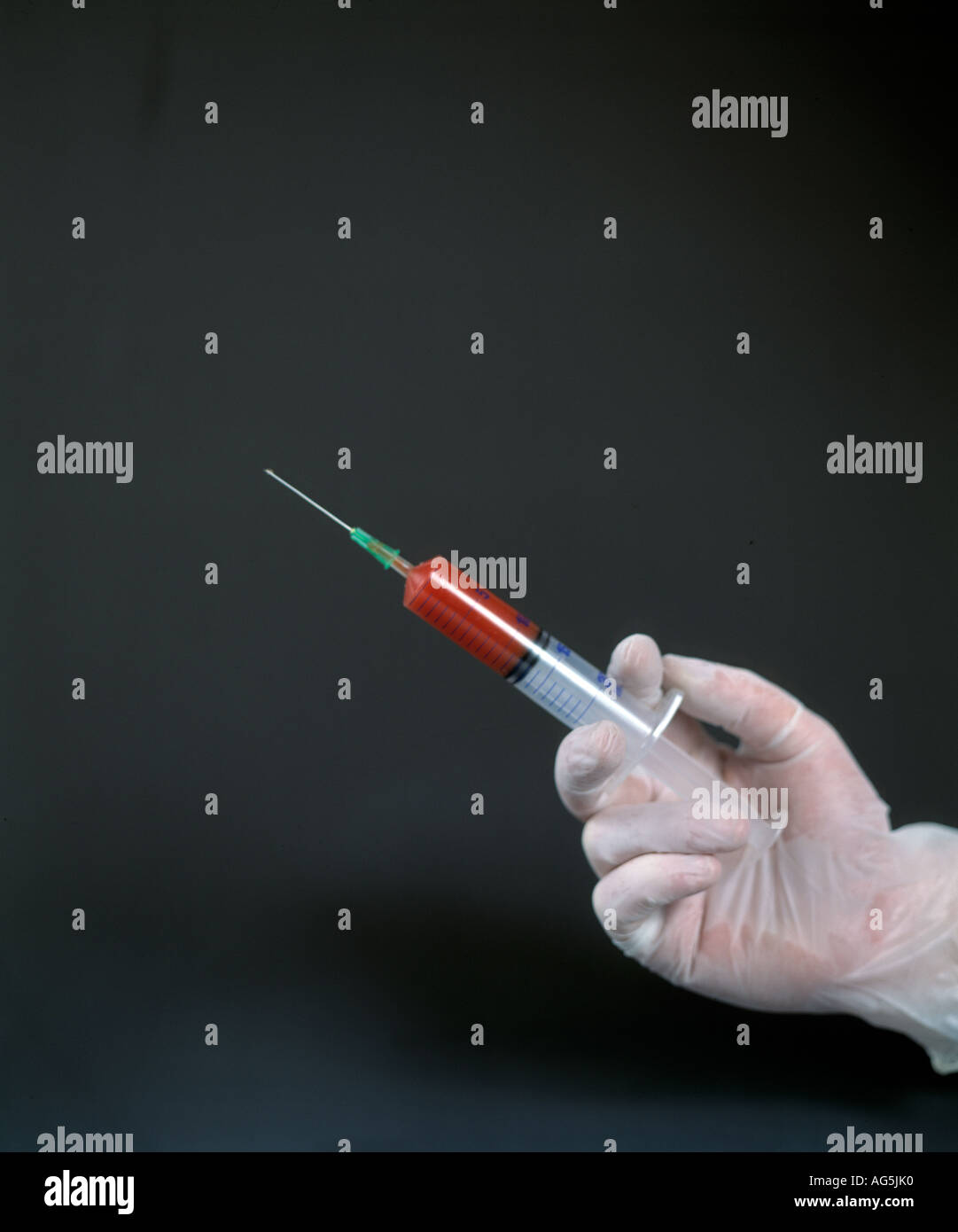 surgical syringe with blood sample Stock Photo - Alamy