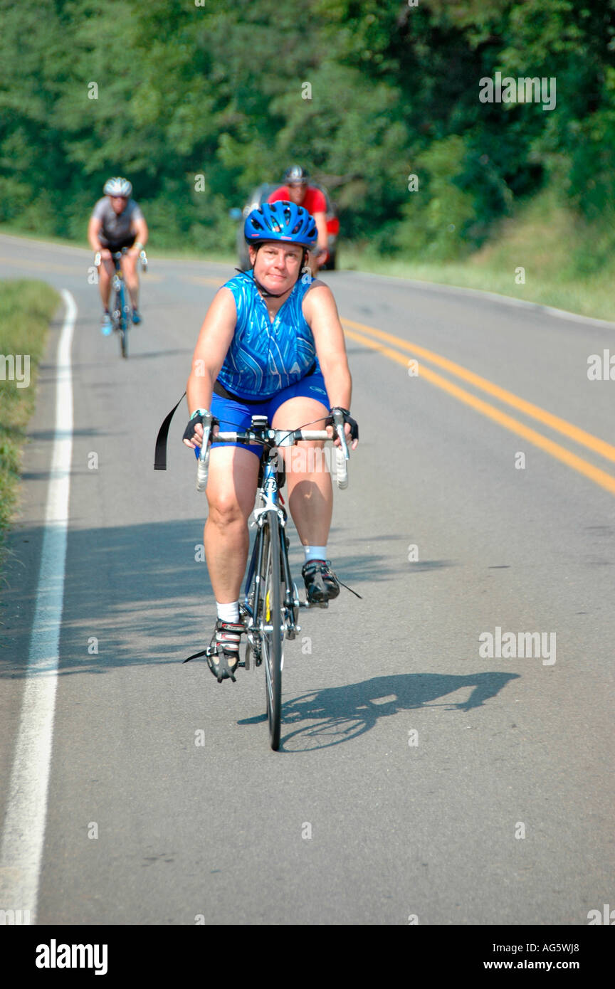 Bicycle riders in full safety gear riding the public highways of the US ...