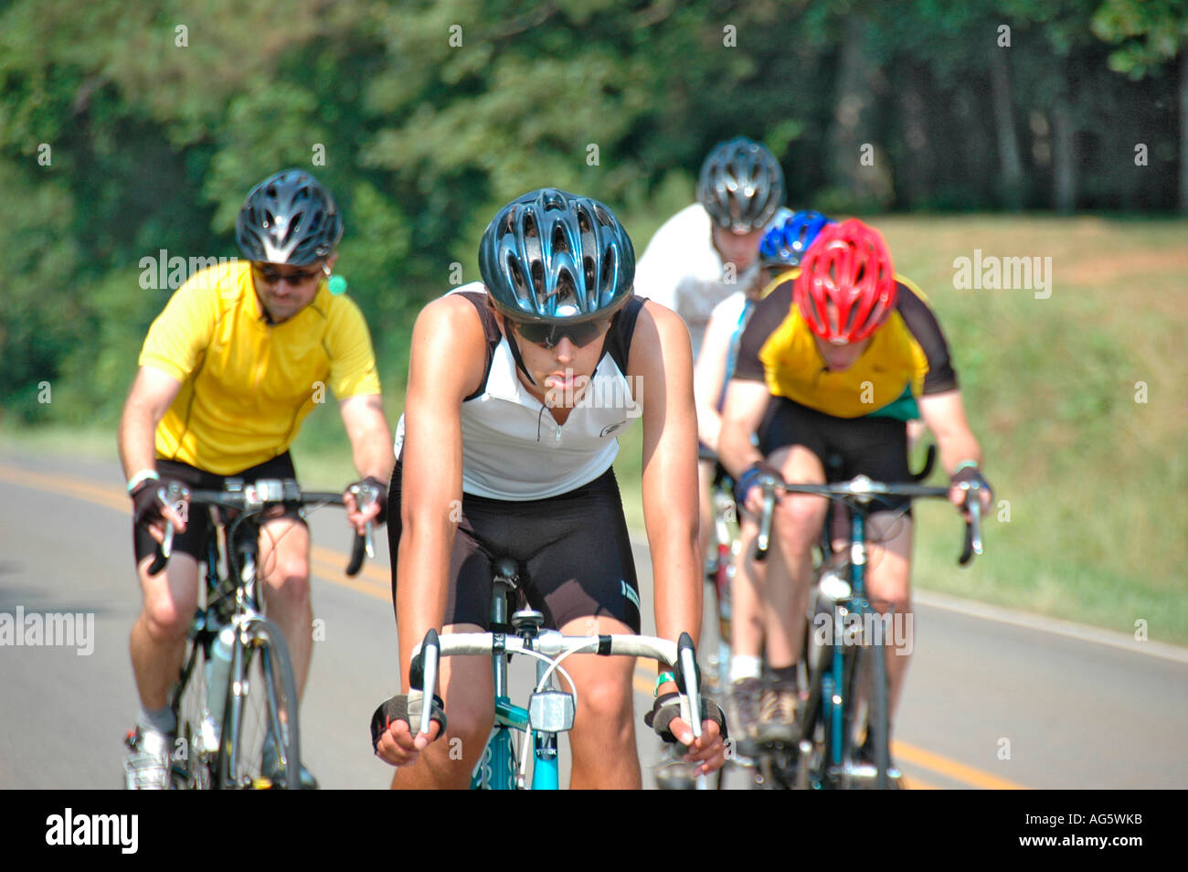 Bicycle riders in full safety gear riding the public highways of the US ...