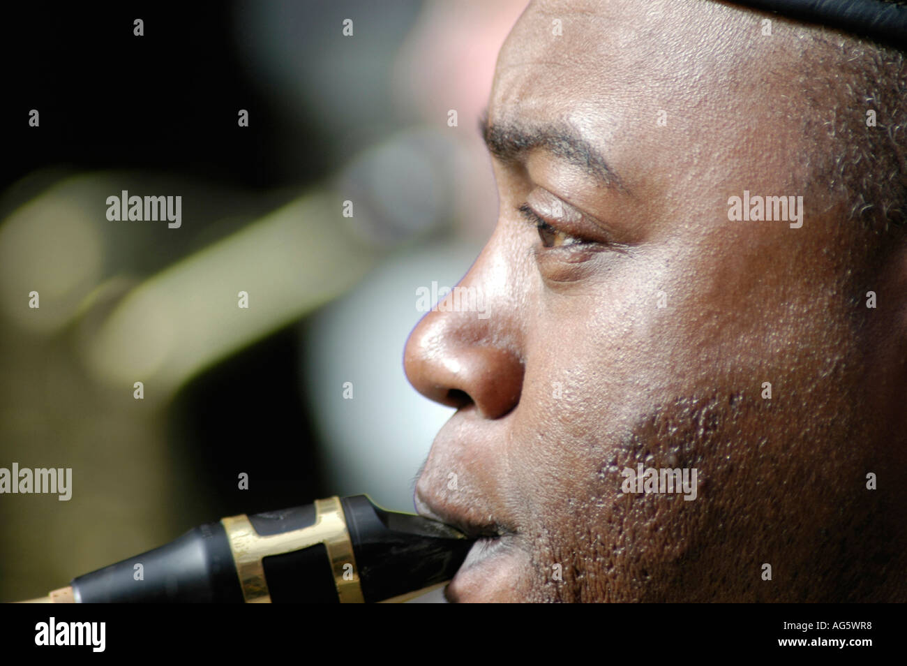 Man playing a real musical instrument Clarinet in a group Stock Photo ...