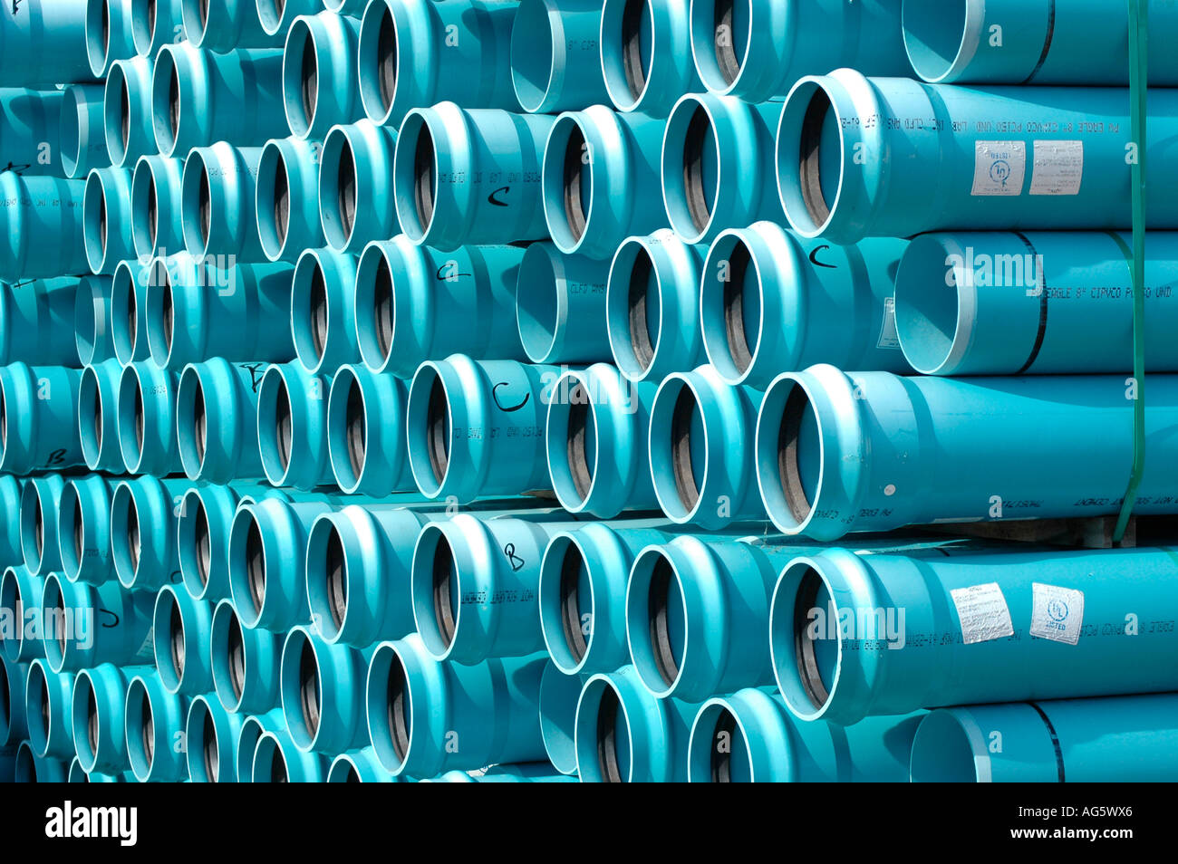 Stacked new gas - sewer pipe for utility company installation and ...