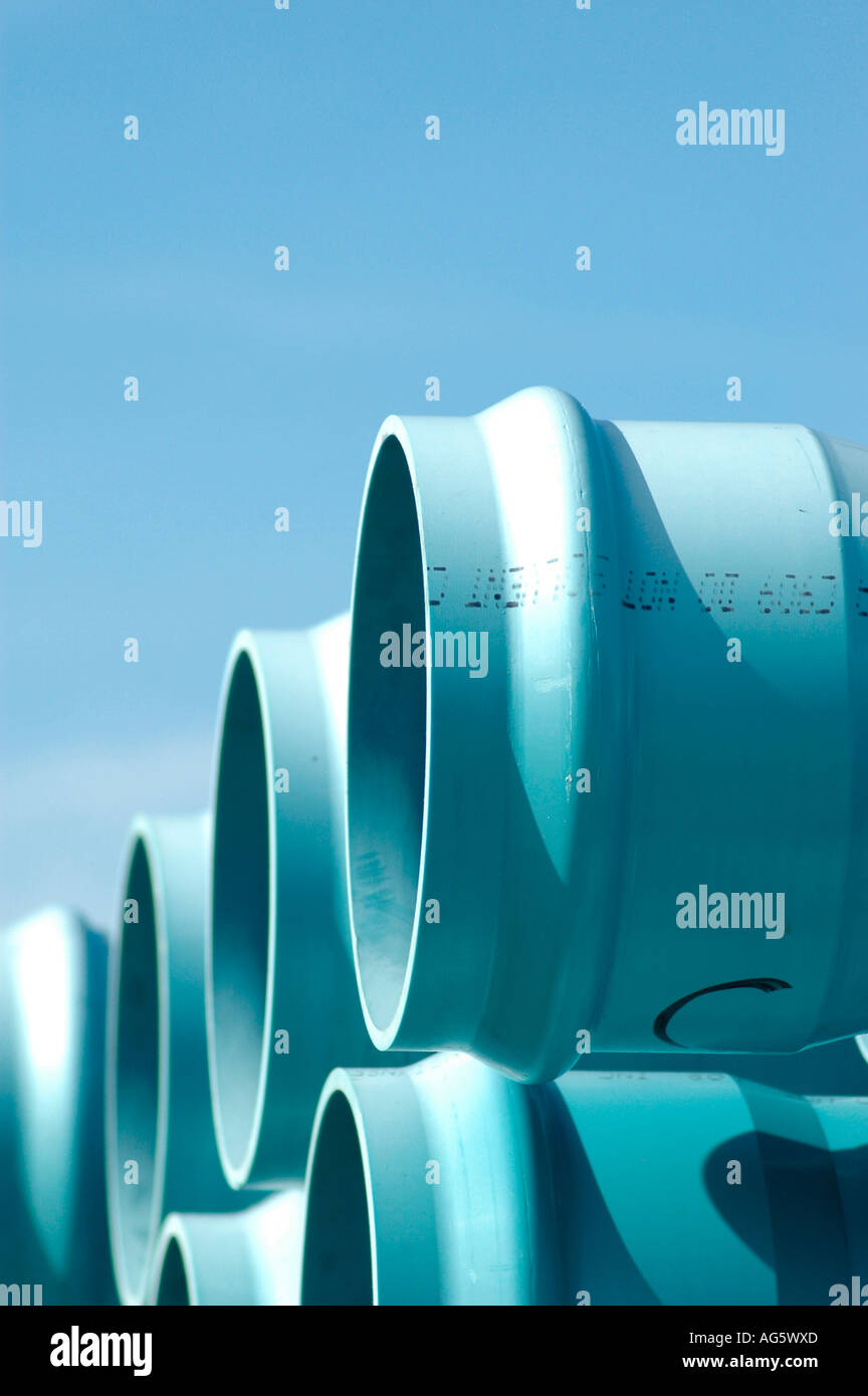 Stacked new gas - sewer pipe for utility company installation and ...