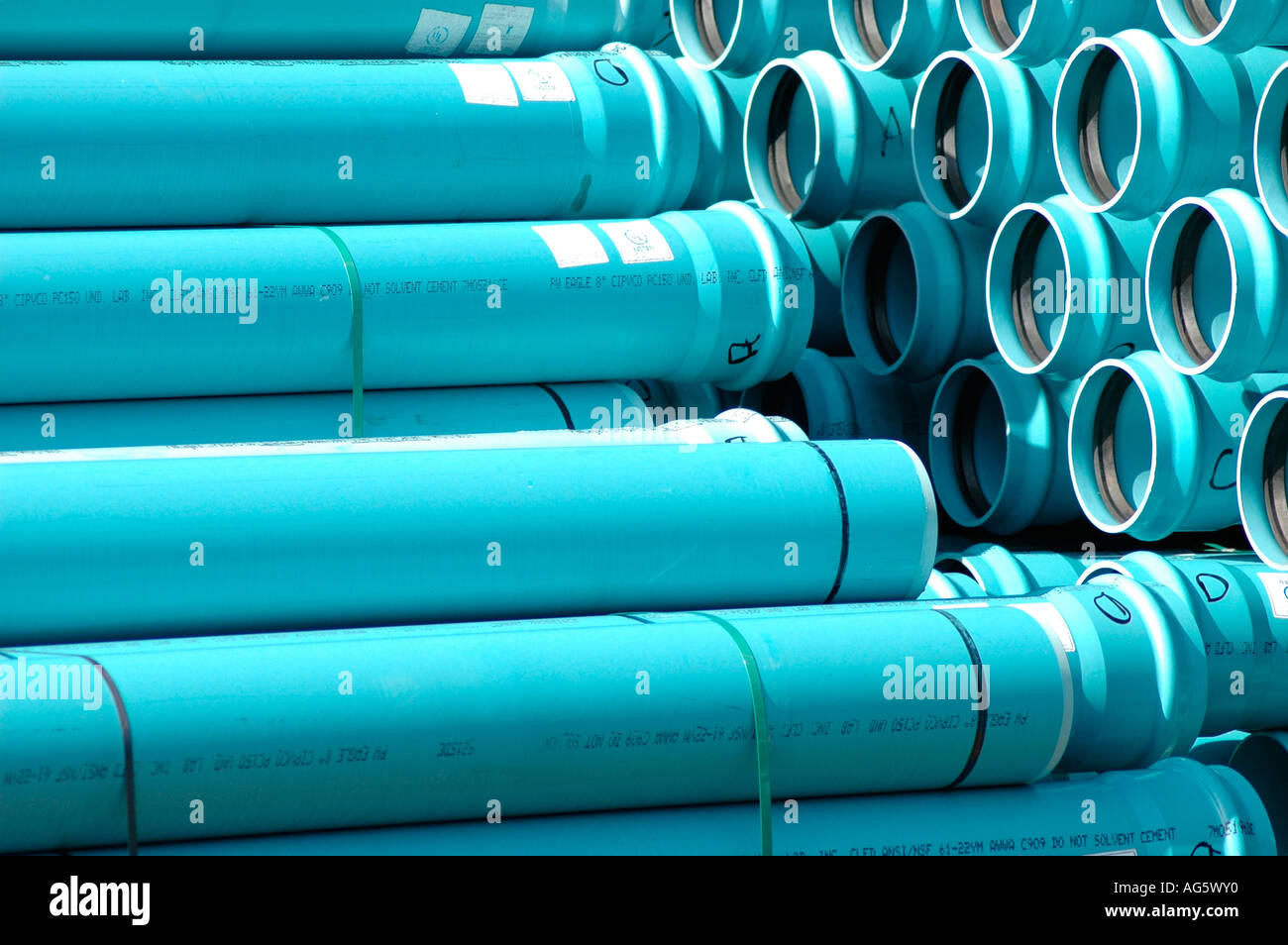 Stacked new gas - sewer pipe for utility company installation and ...