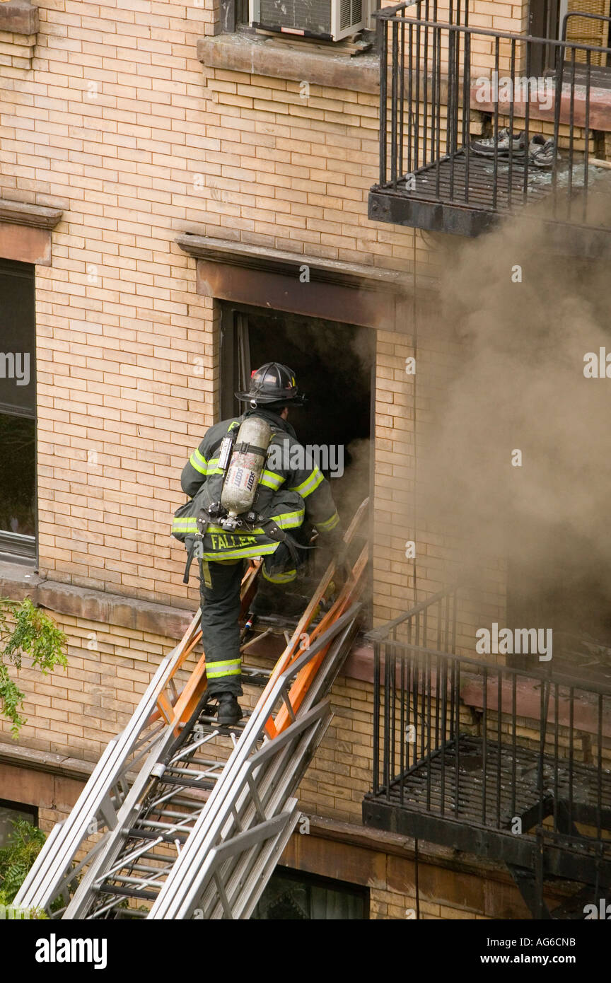 Fireman entering burning building hi-res stock photography and images ...