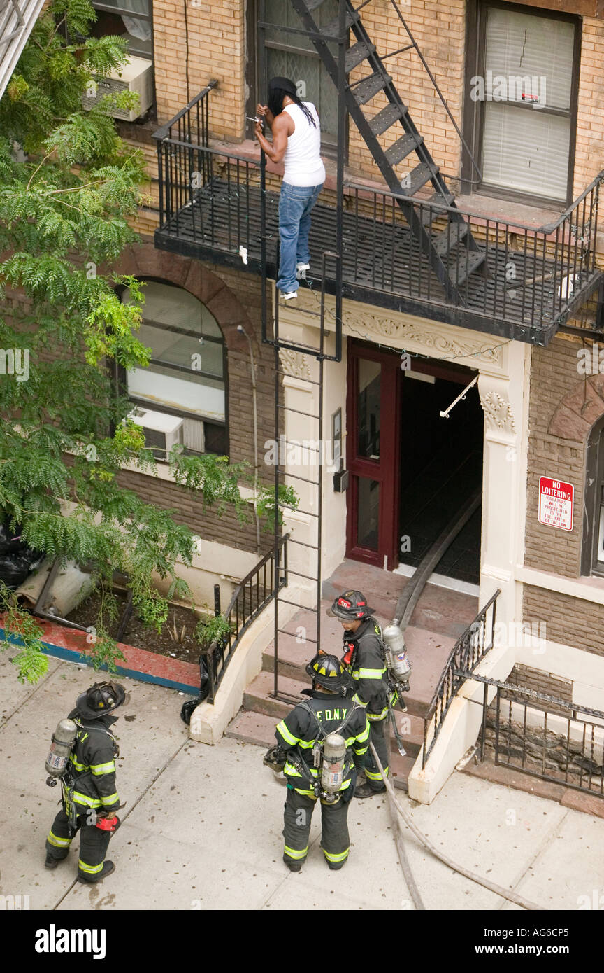 Fireman entering burning building hi-res stock photography and images ...
