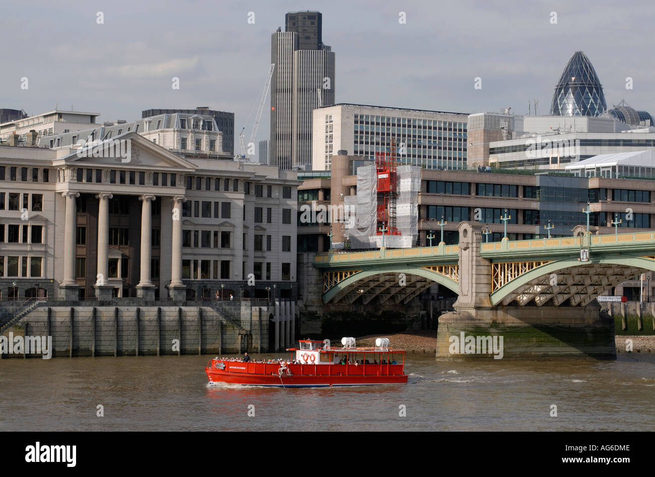 A red river cruise boat the Withycombe travels up the river Thames It ...