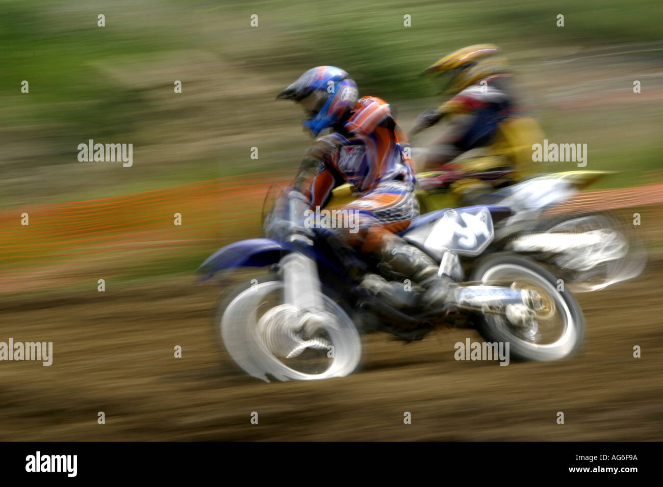 moto cross motorcycles racing each other Stock Photo - Alamy