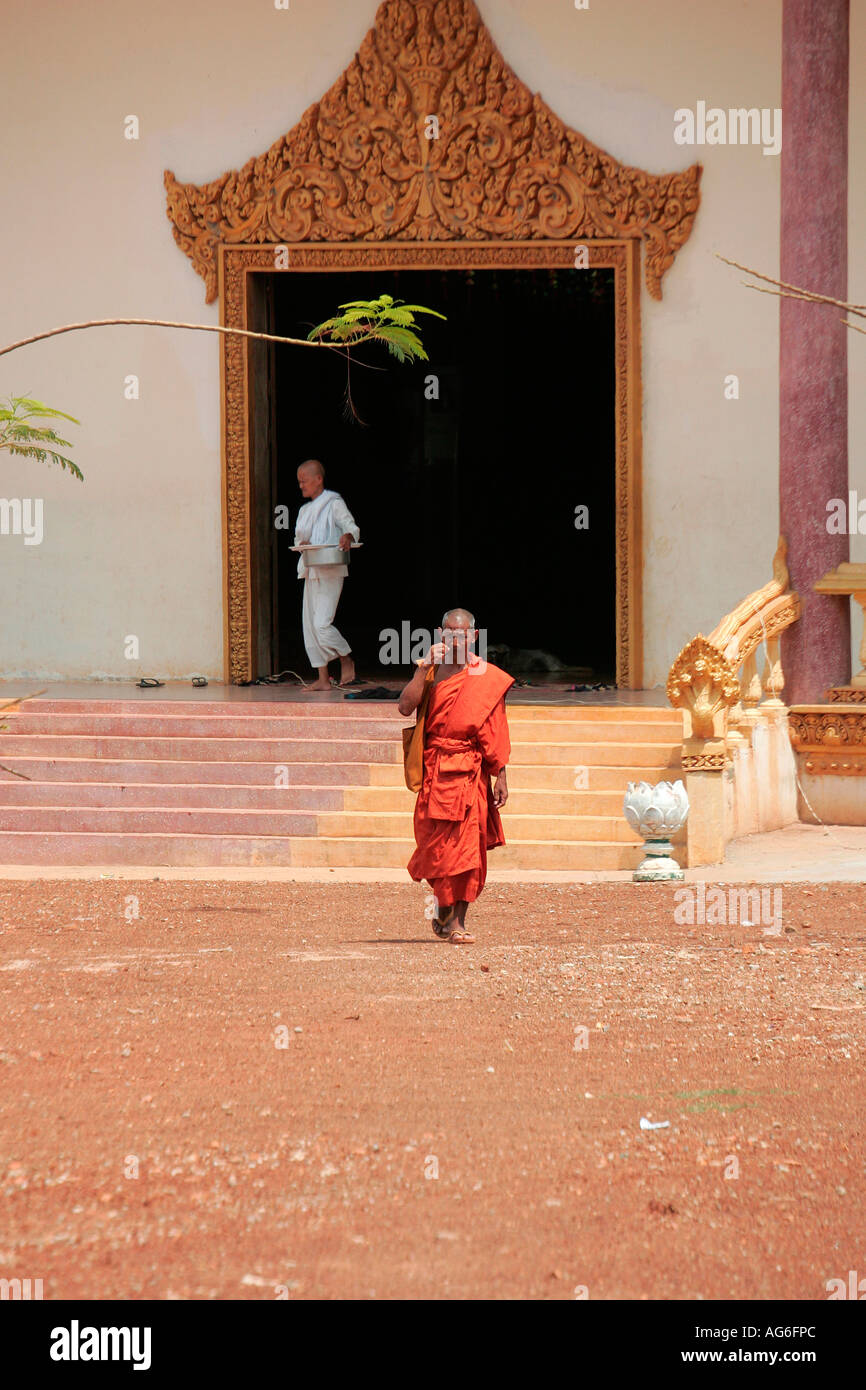 Buddhist monk leaving the temple at Udong, Cambodia Stock Photo - Alamy