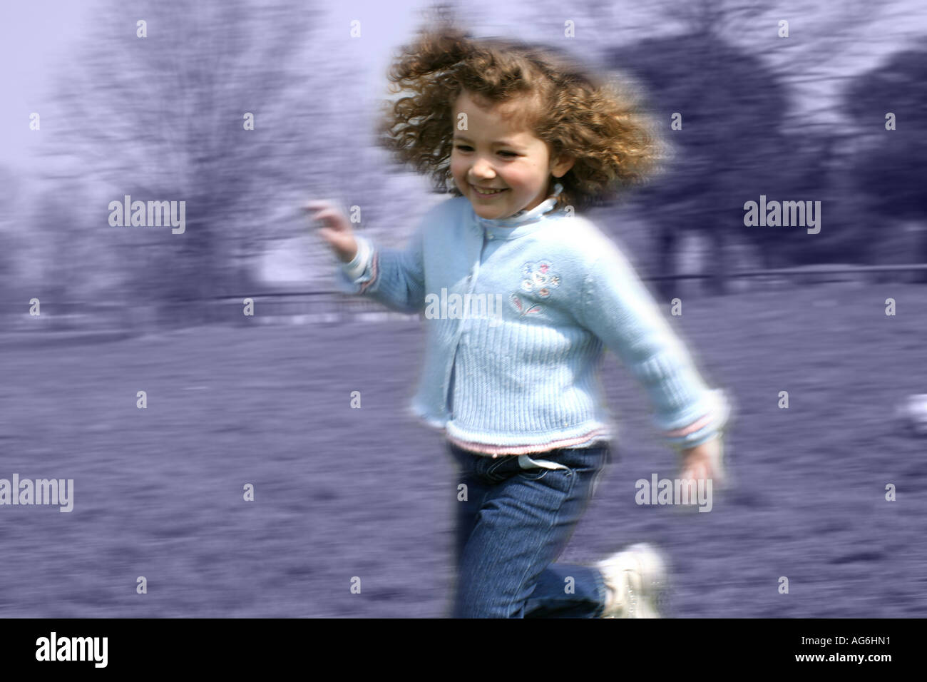 little child running away happily Stock Photo - Alamy