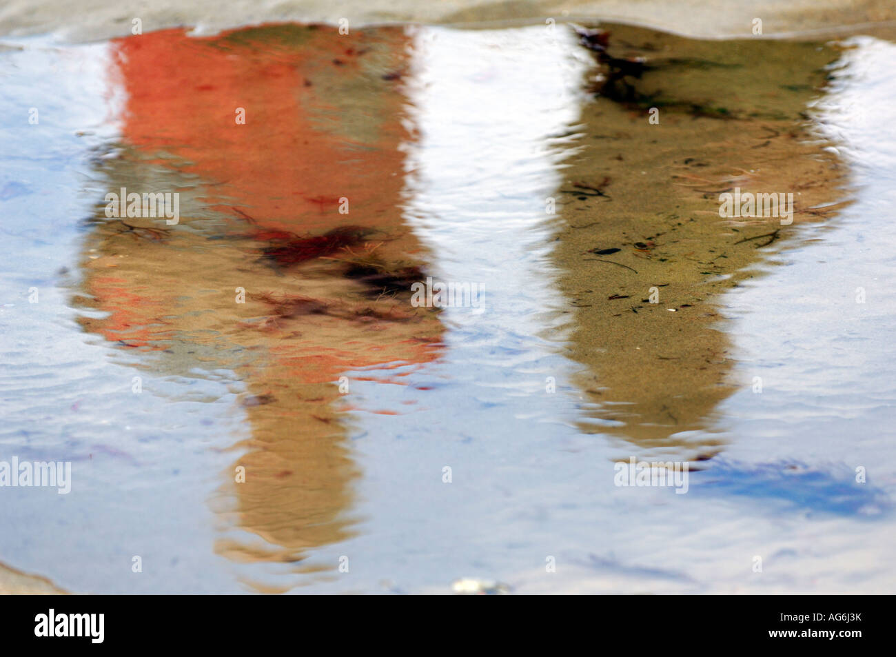Wet reflective sand hi-res stock photography and images - Alamy