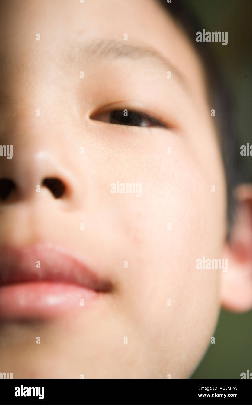 close up of ten year old japanese boy, face, half Stock Photo - Alamy