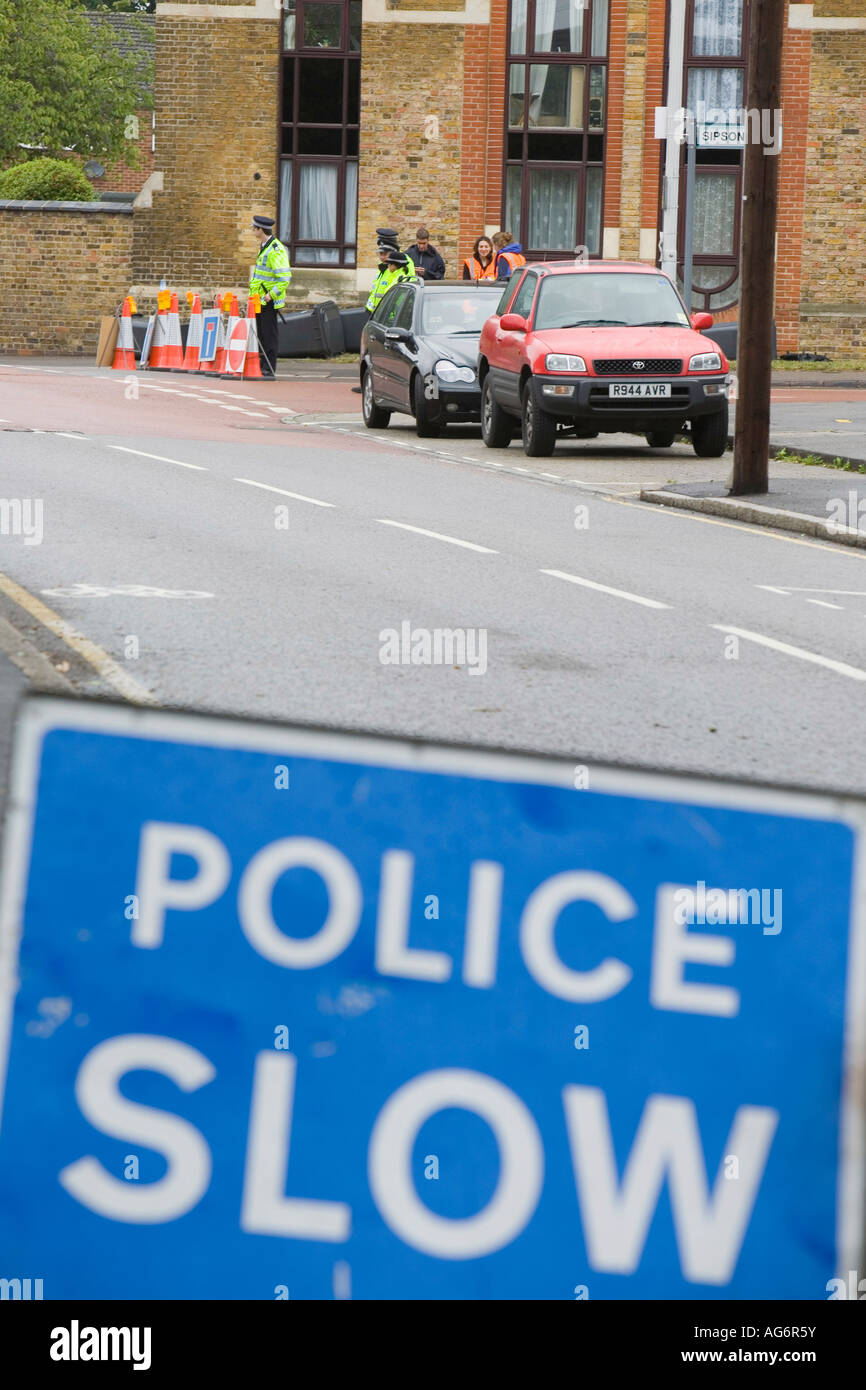 Police block off the road to the Climate Camp protest site Sipson ...