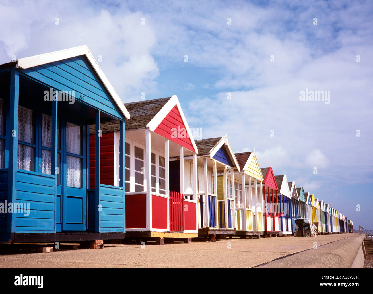 UK Suffolk Southwold colourfully painted beach huts on seafront Stock ...
