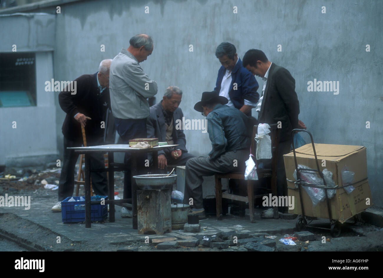 Men playing mayong in Beijing, China Stock Photo - Alamy